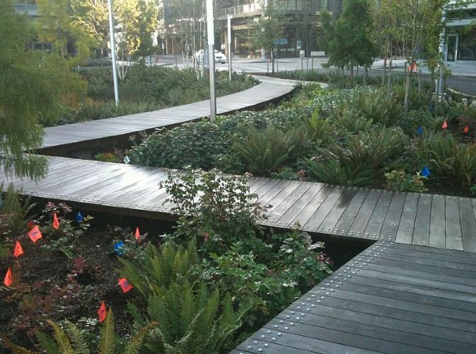 South Waterfront Park Boardwalk and Seating Logs by Wolf Industries ...